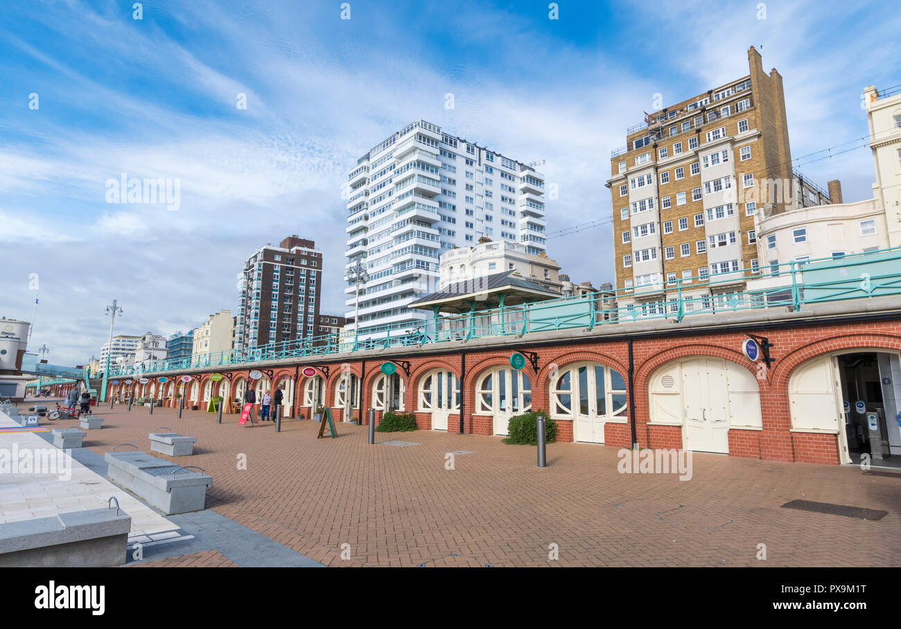 Row of refirbished seafront arches by the beach in Brighton, East ...