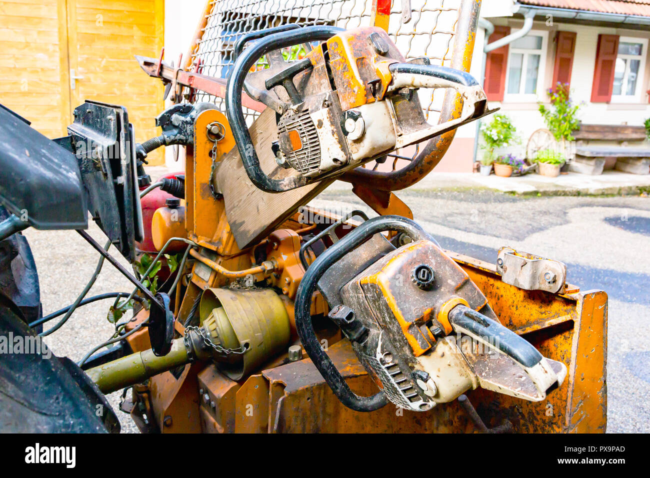 Multiple random power tools including saws connected to each other with ...