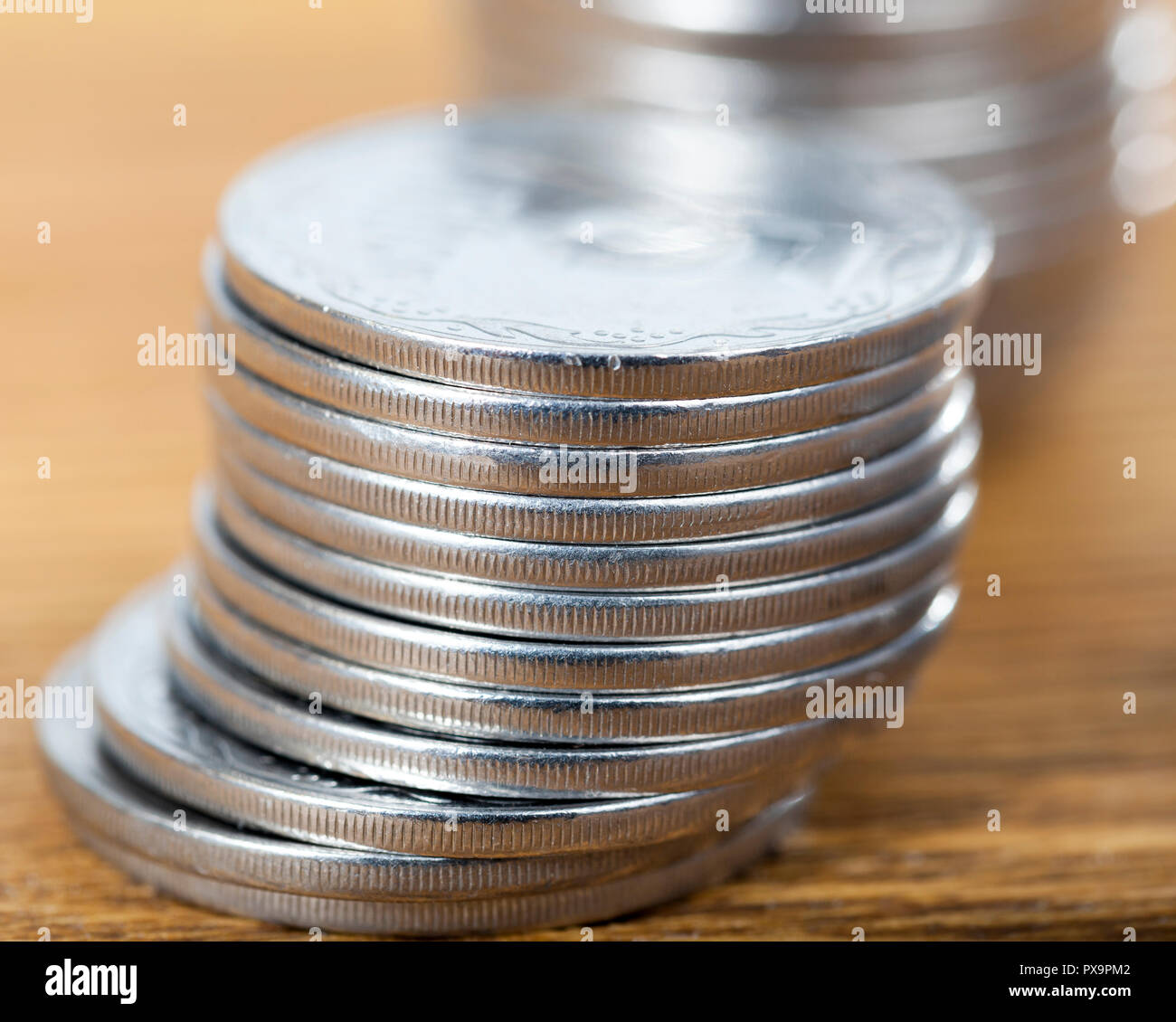 steel metal coins lying in a pile, closeup of cash Stock Photo - Alamy