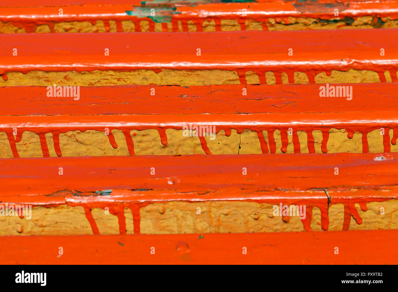 red wooden bench Stock Photo - Alamy