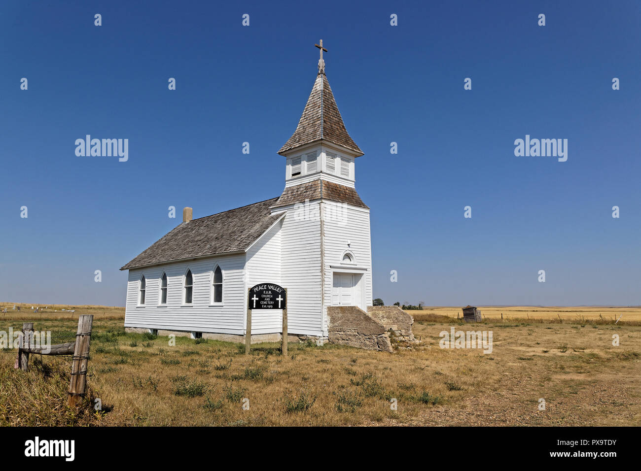 A small white church lost in the plains of North Dakota Stock Photo - Alamy