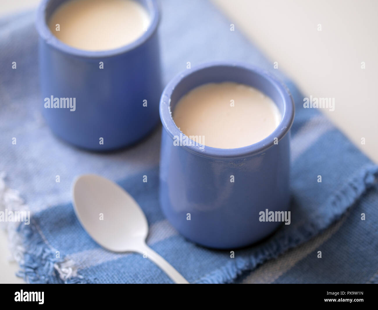 Natural yogurt in blue jars Stock Photo - Alamy