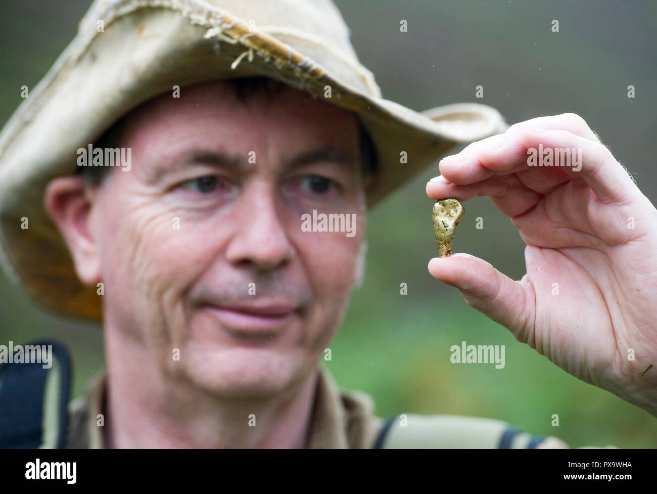 Gold panning course for visitors and tourists on the Mennock water near ...