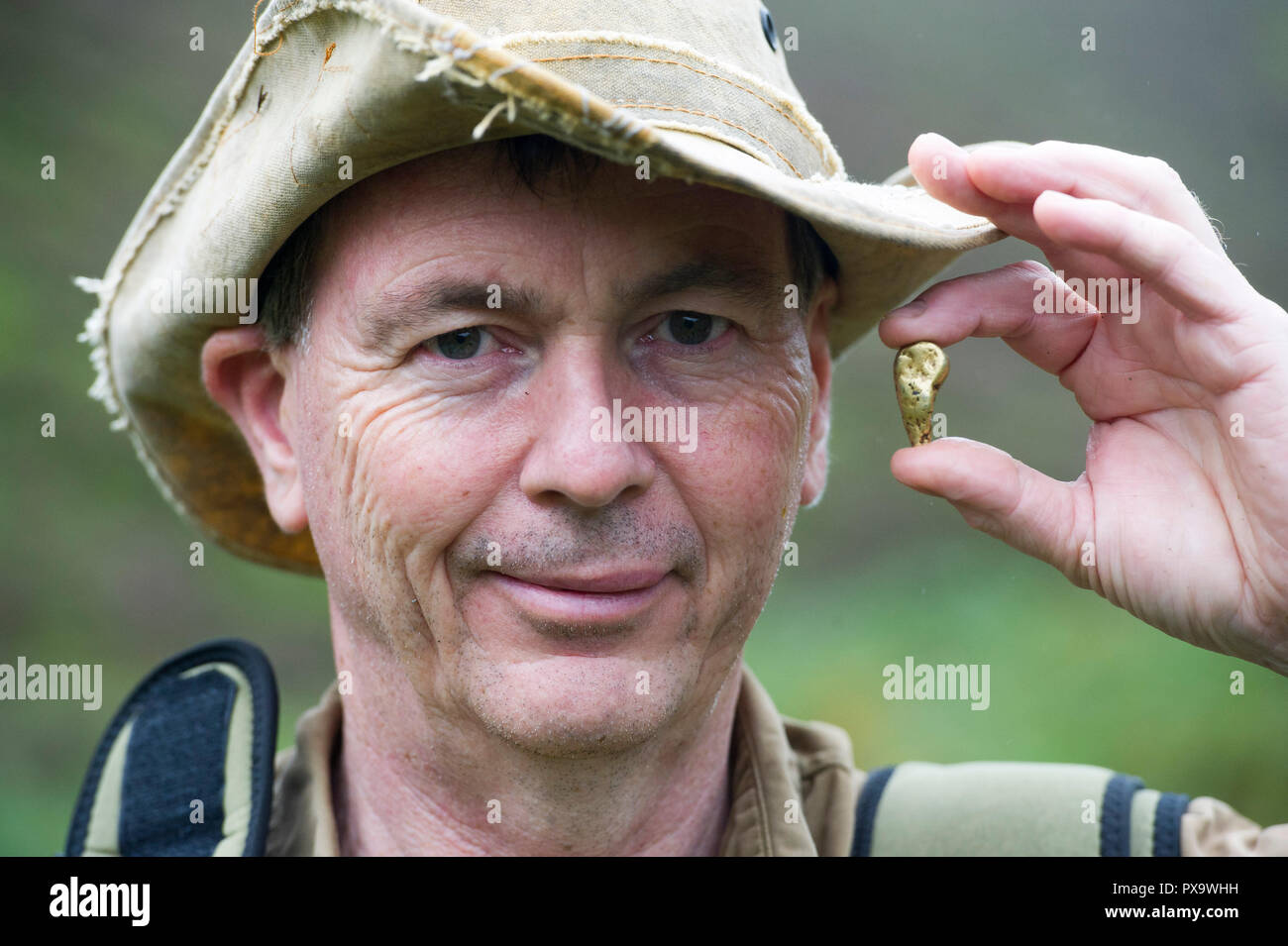 Gold panning course for visitors and tourists on the Mennock water near ...