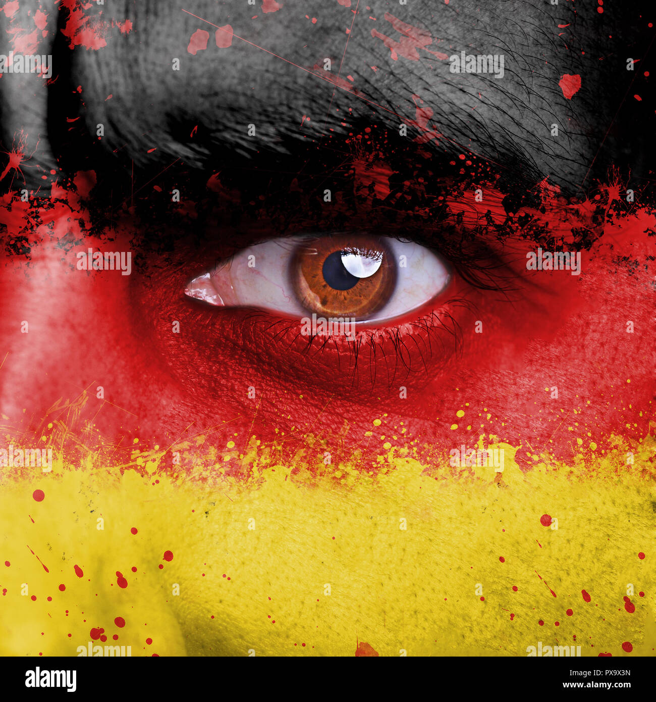 Germany flag painted on angry man face Stock Photo - Alamy