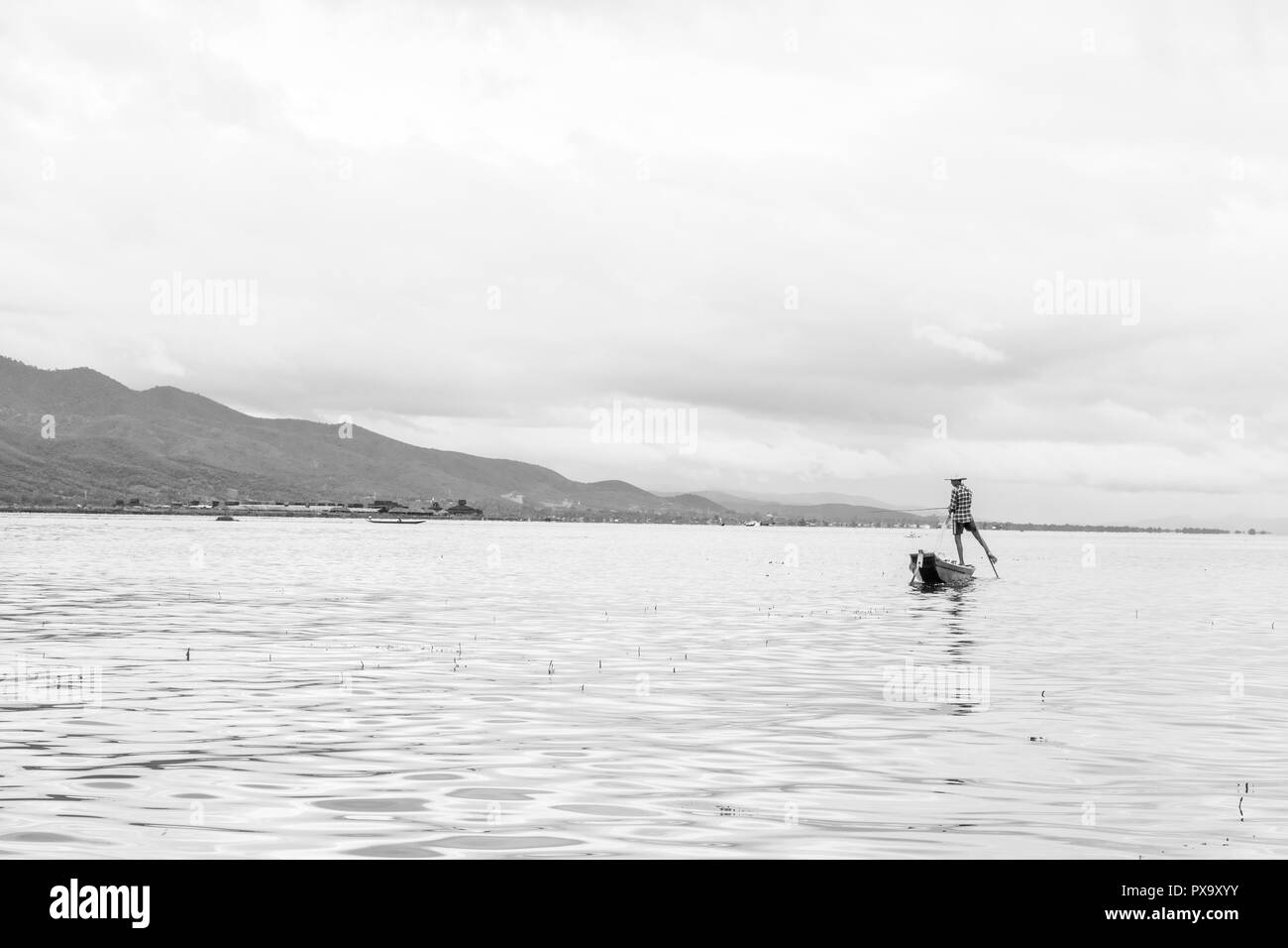 Local people on boat Black and White Stock Photos & Images - Alamy