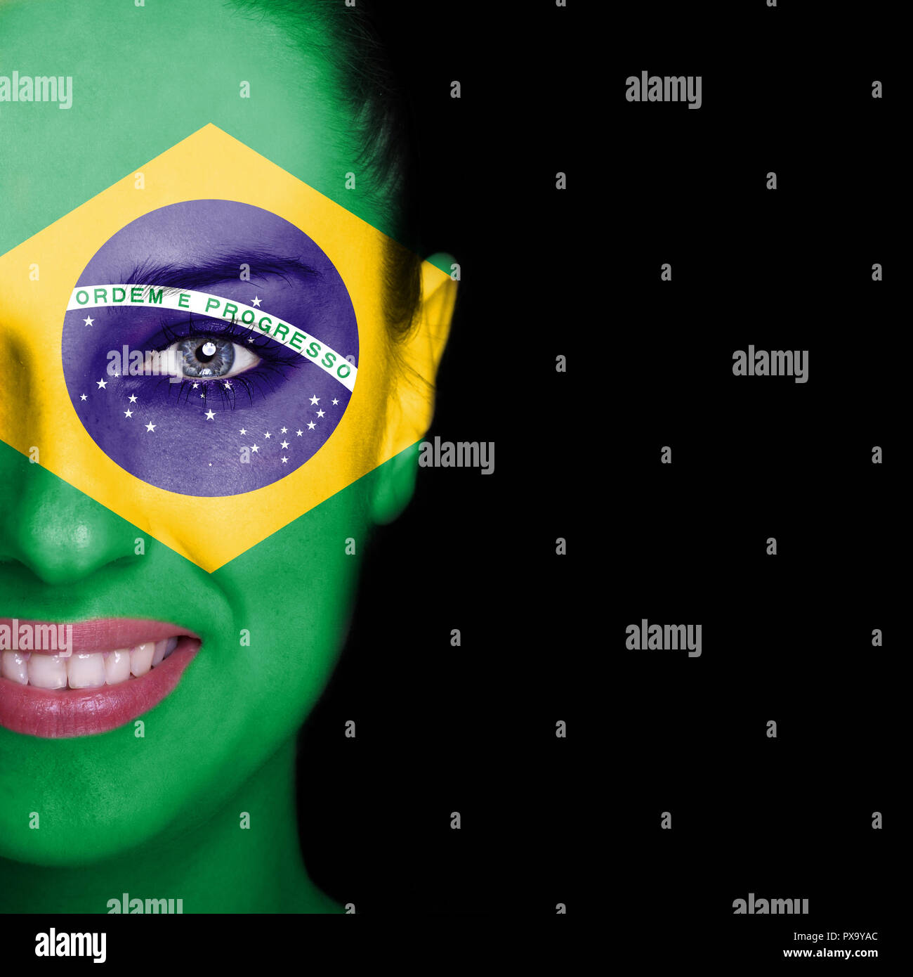 Brazil flag painted on smiling woman face Stock Photo - Alamy
