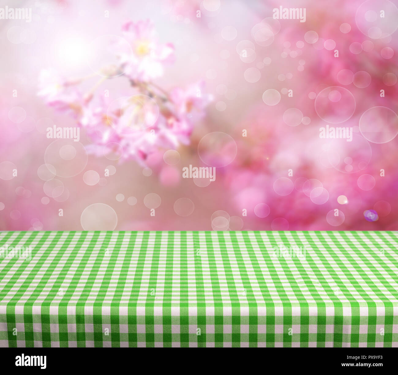 empty table for product display montages - spring theme Stock Photo - Alamy