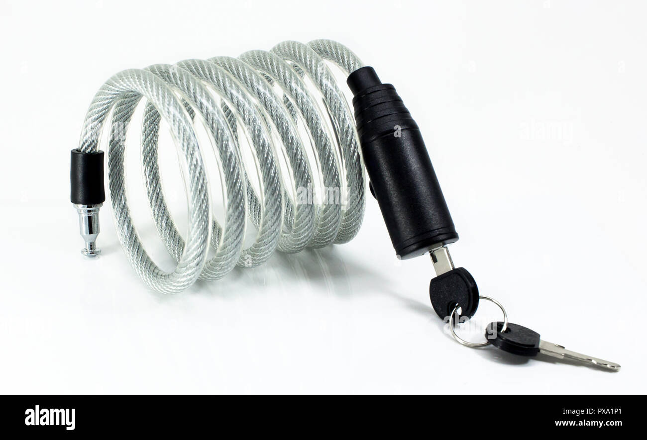 Bike cable lock with key isolated on white Stock Photo - Alamy