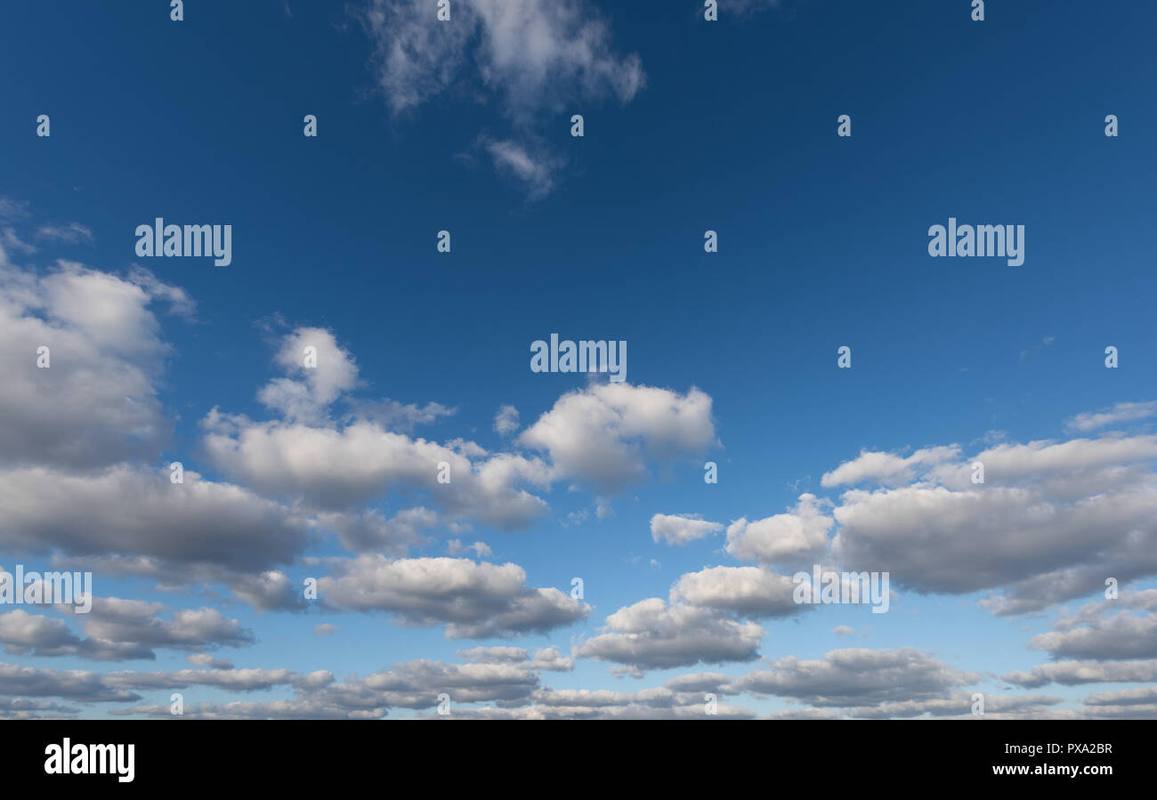 Blue sky with soft little clouds Stock Photo - Alamy