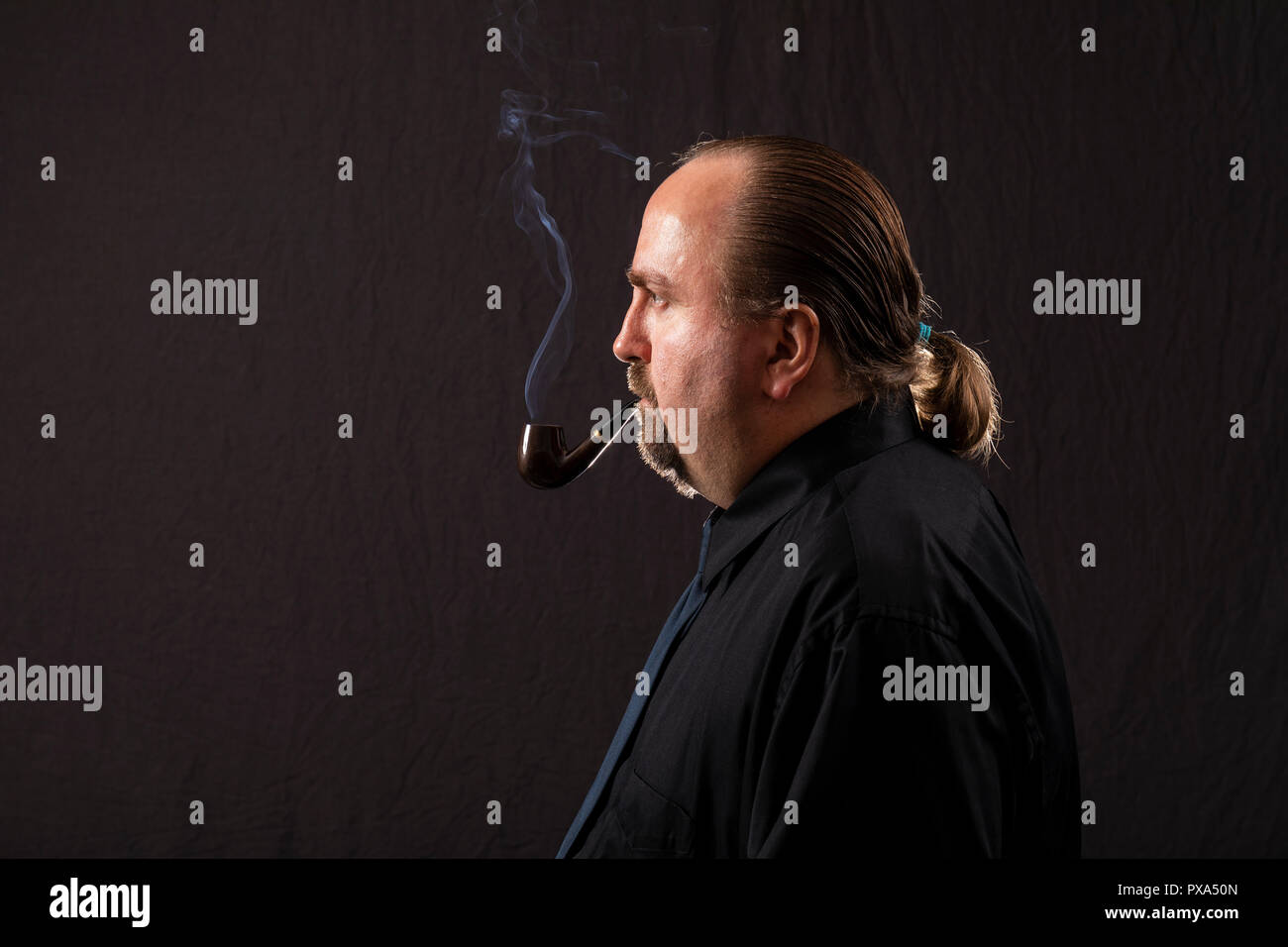 Man Smoking A Pipe Stock Photo - Alamy