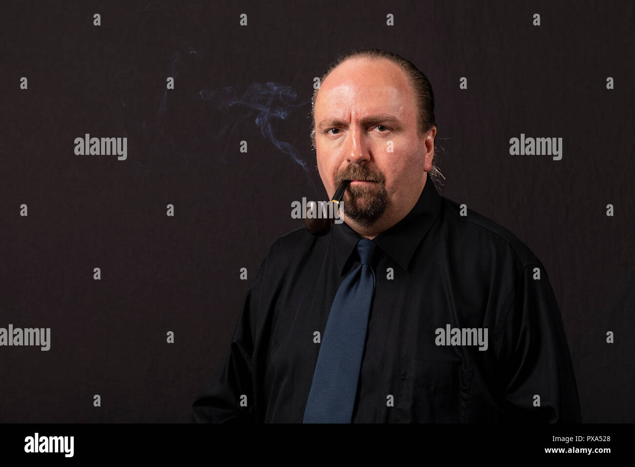 Man Smoking A Pipe Stock Photo - Alamy