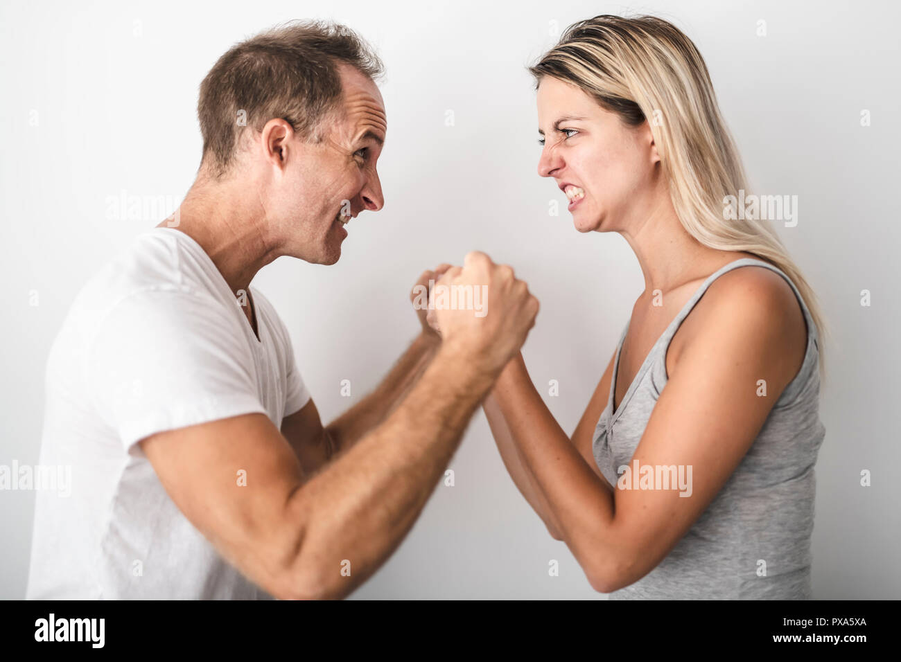 A Couple dispute at home each other are frustrated Stock Photo - Alamy