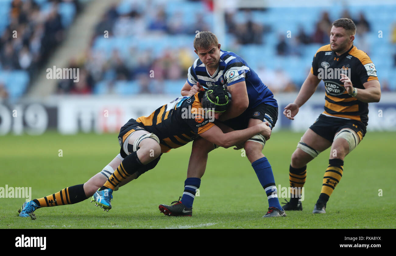 Bath's Tom Ellis is tackled by Wasps James Gaskell during the Heineken ...