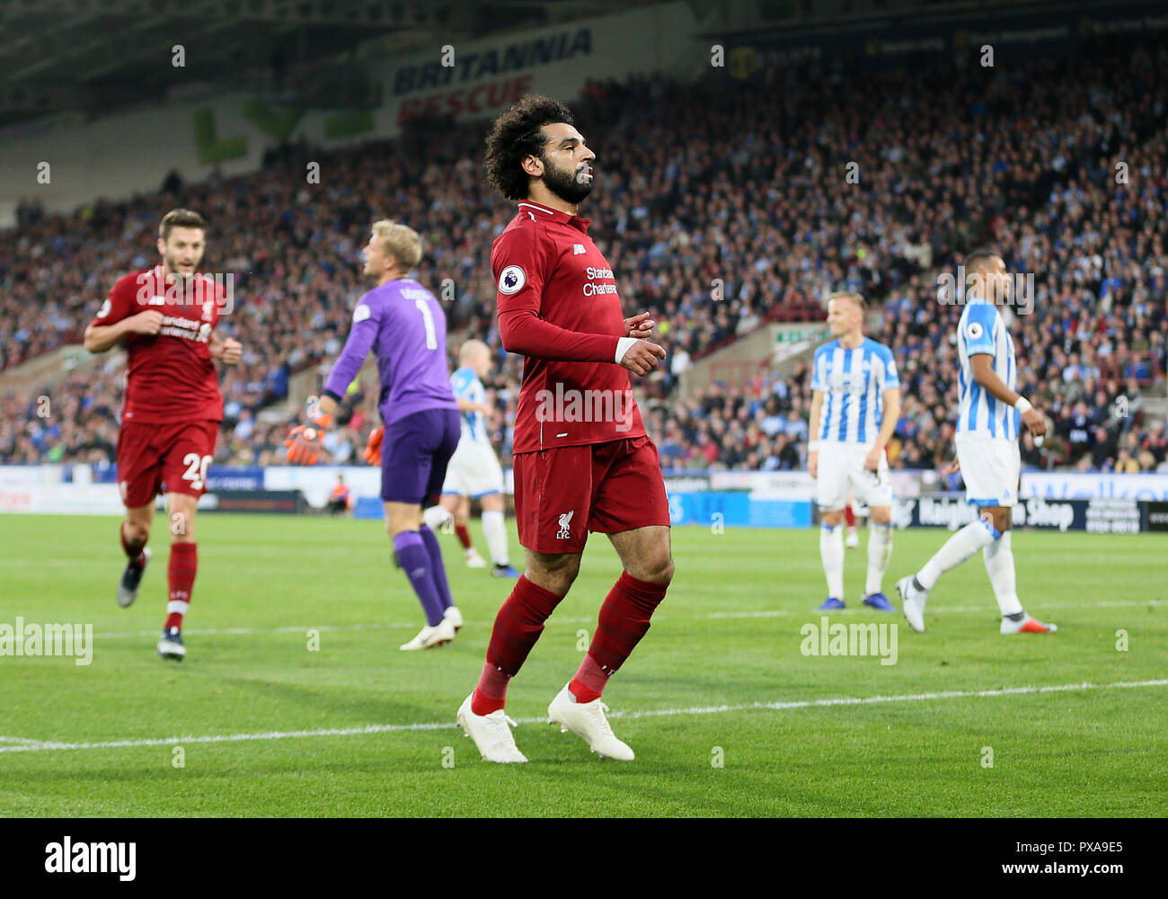 Liverpool's Mohamed Salah celebrates scoring his side's first goal of ...