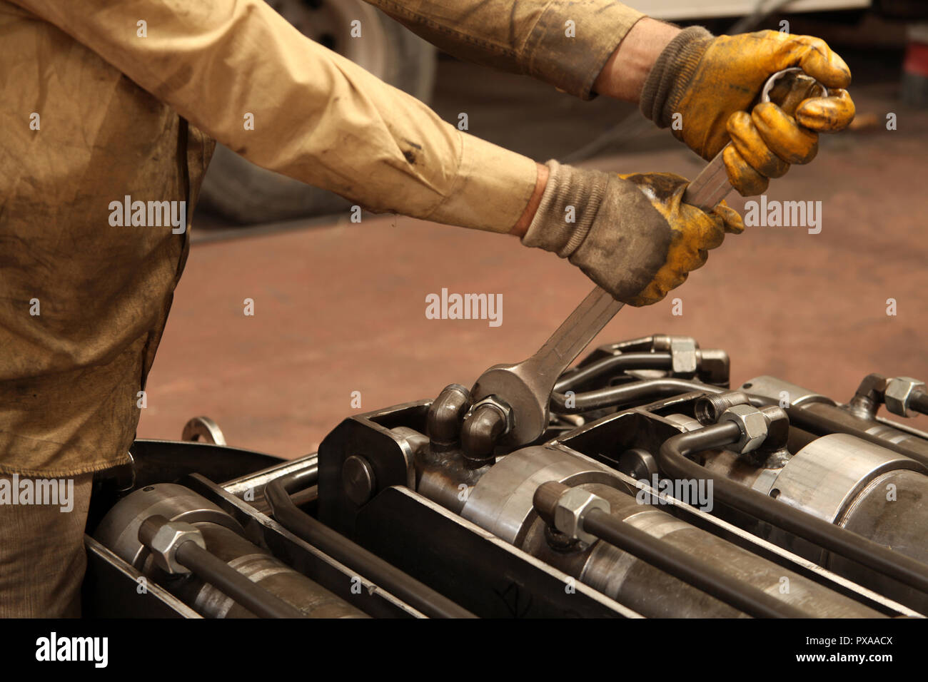 worker works in factory Stock Photo - Alamy
