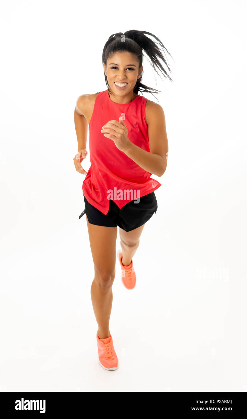 Young attractive happy latin woman in sport clothes with beautiful ...