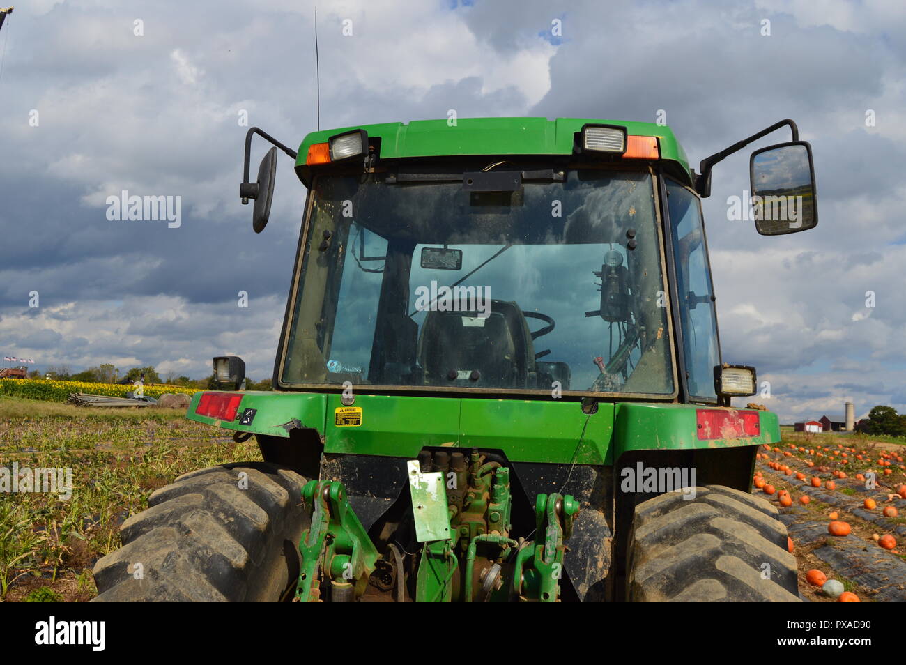 Tractor at the pumpkin patch Stock Photo - Alamy