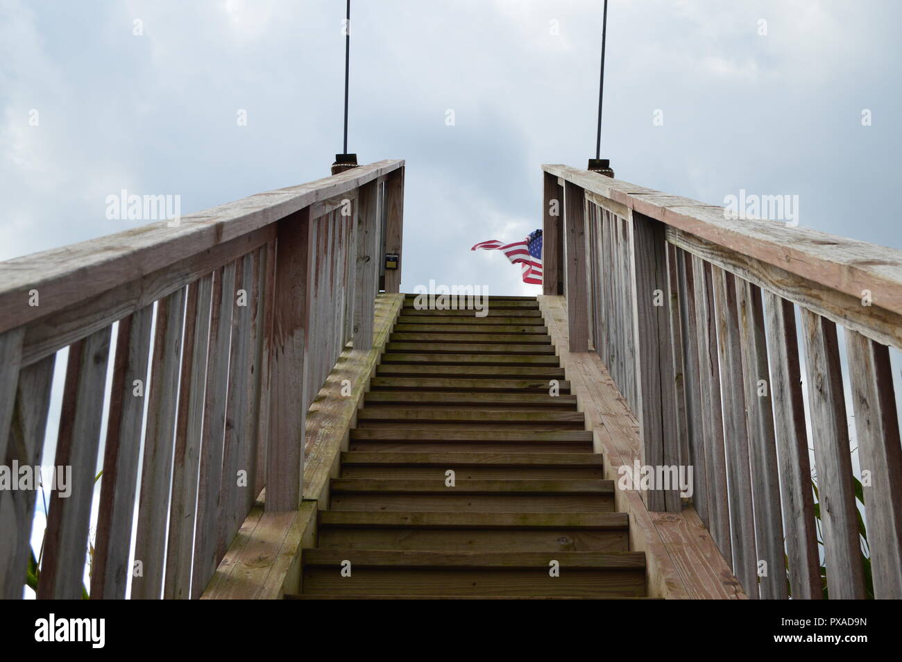 Stairs leading to an American Flag Stock Photo - Alamy