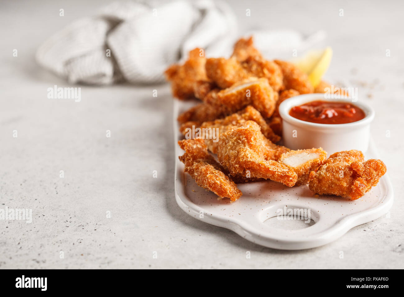 Chicken strips on white background hi-res stock photography and images ...