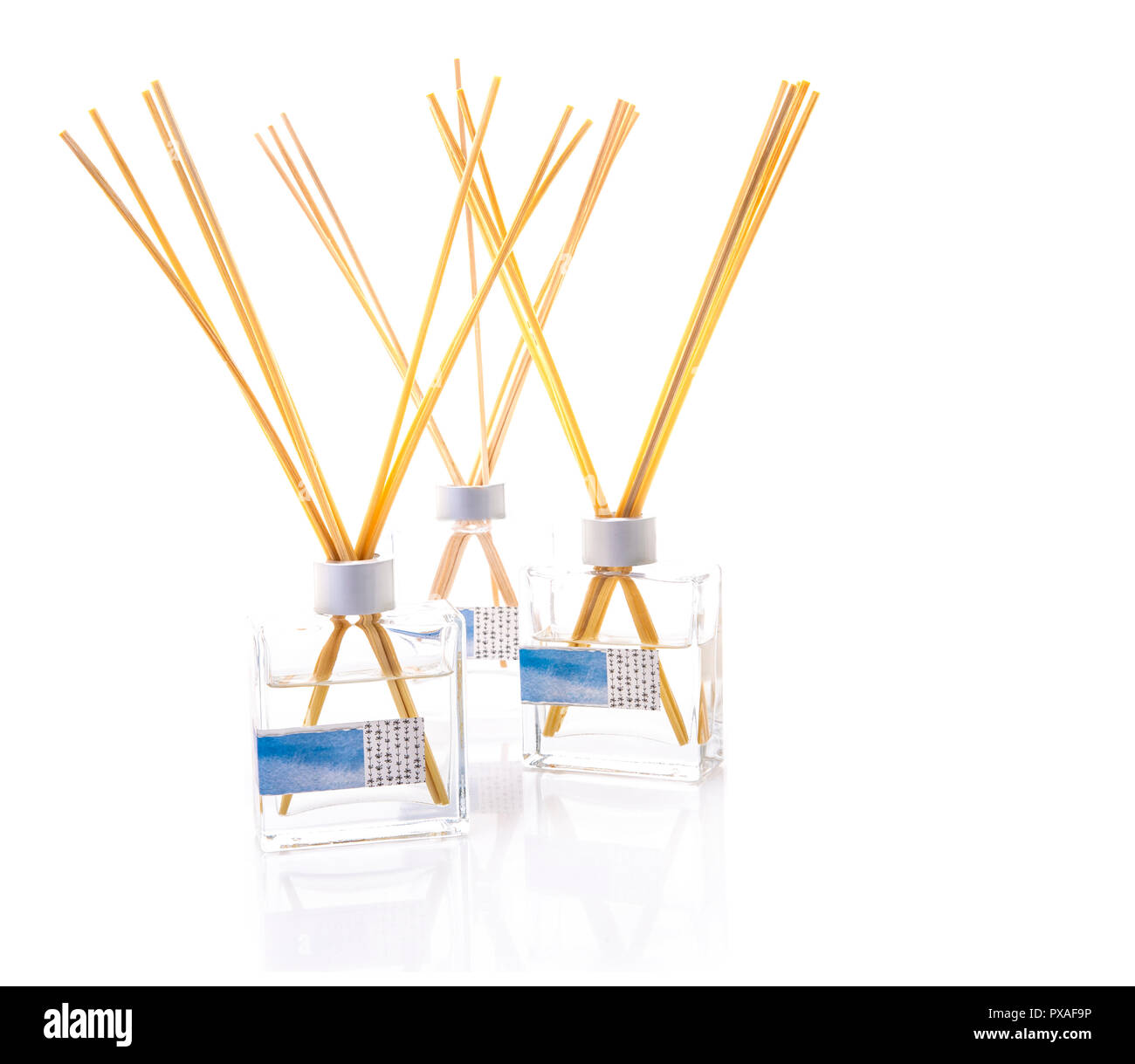 Three Reed Defusers on a white background Stock Photo - Alamy