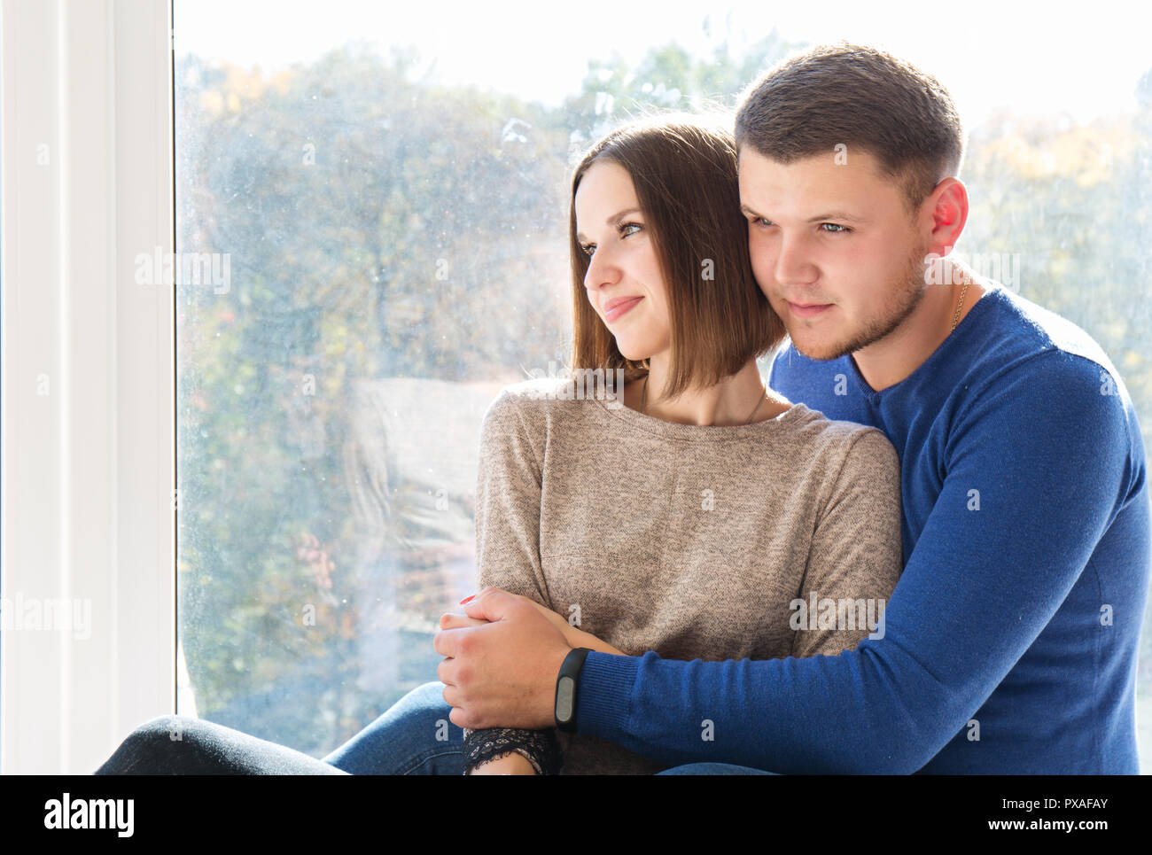 sitting on a window Stock Photo - Alamy