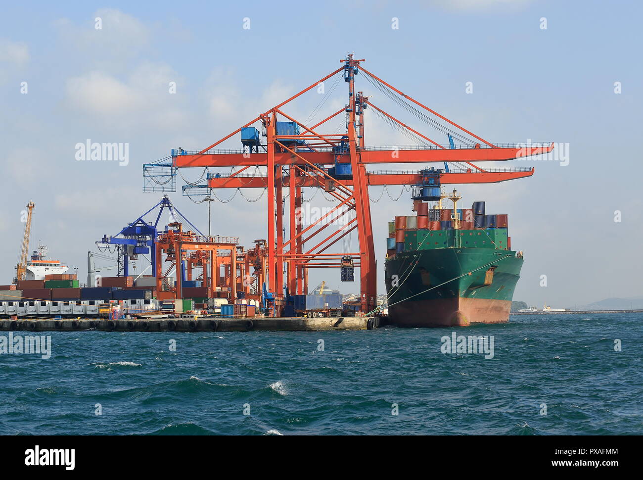 Container loading in port Stock Photo - Alamy