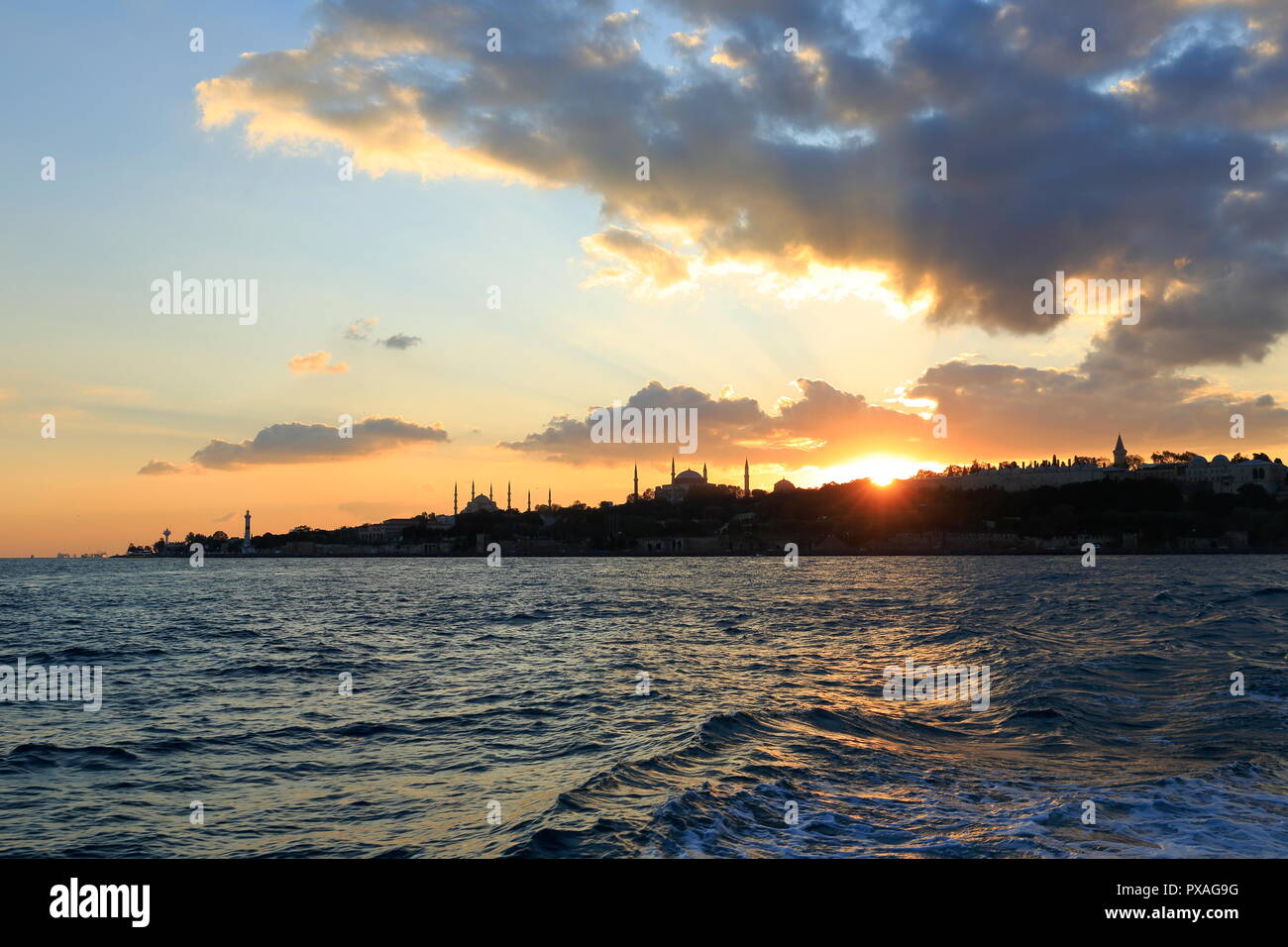 Istanbul at sunset. The skyline of Sultanahmet and Hagia Sophia are ...