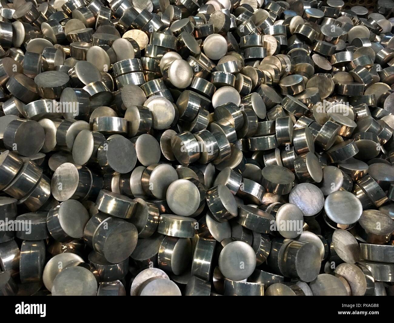Stack of aluminum flakes in a metalworking factory Stock Photo - Alamy