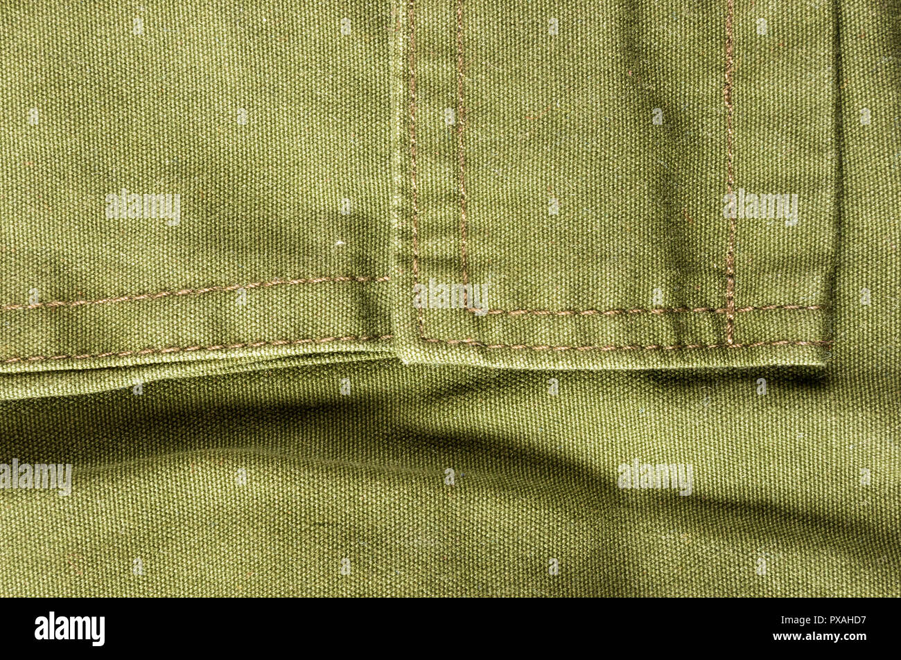 clothing items washed cotton fabric texture with seams, macro, close-up ...
