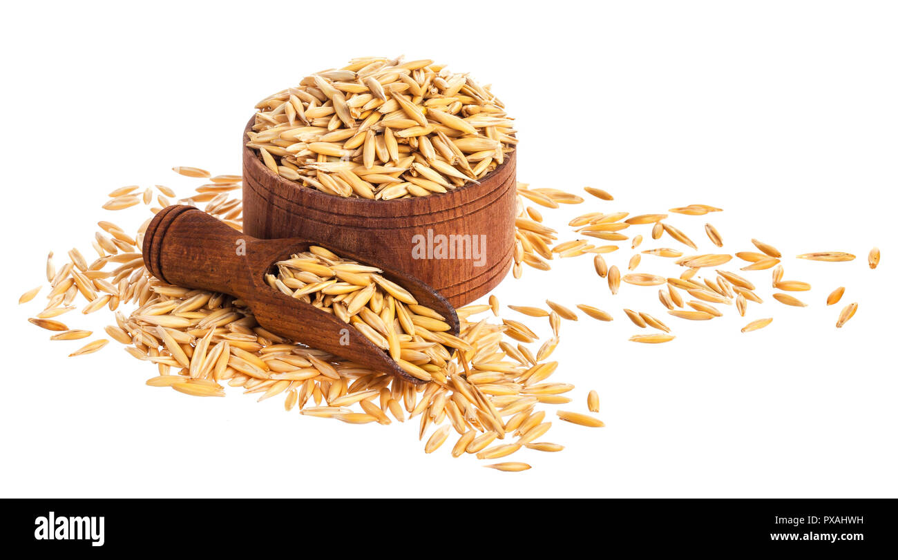Oat seeds in scoop isolated on white background Stock Photo - Alamy
