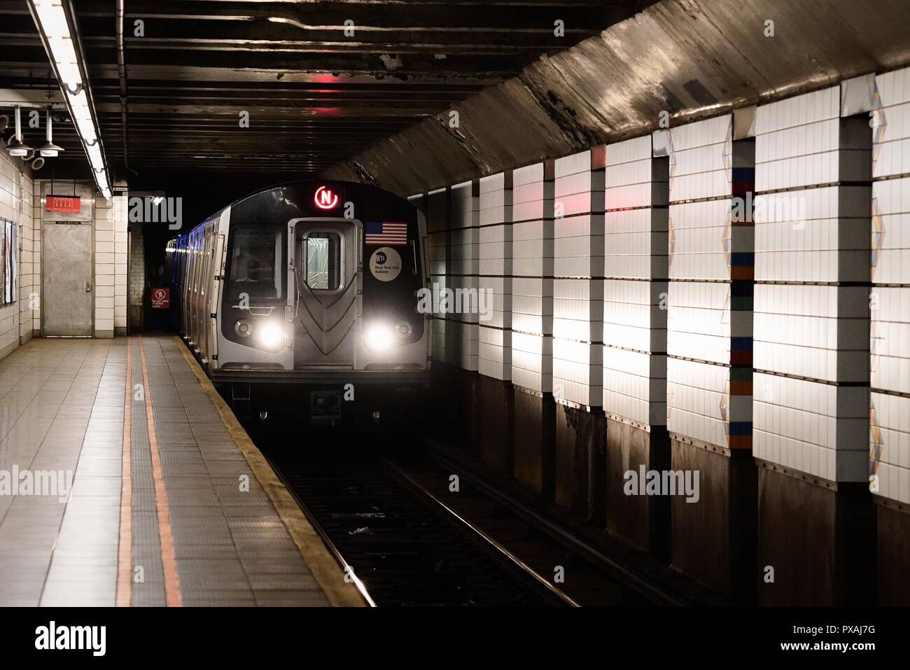 New York, NY; Aug 2018: NYC Subway Trains approaching and leaving a ...