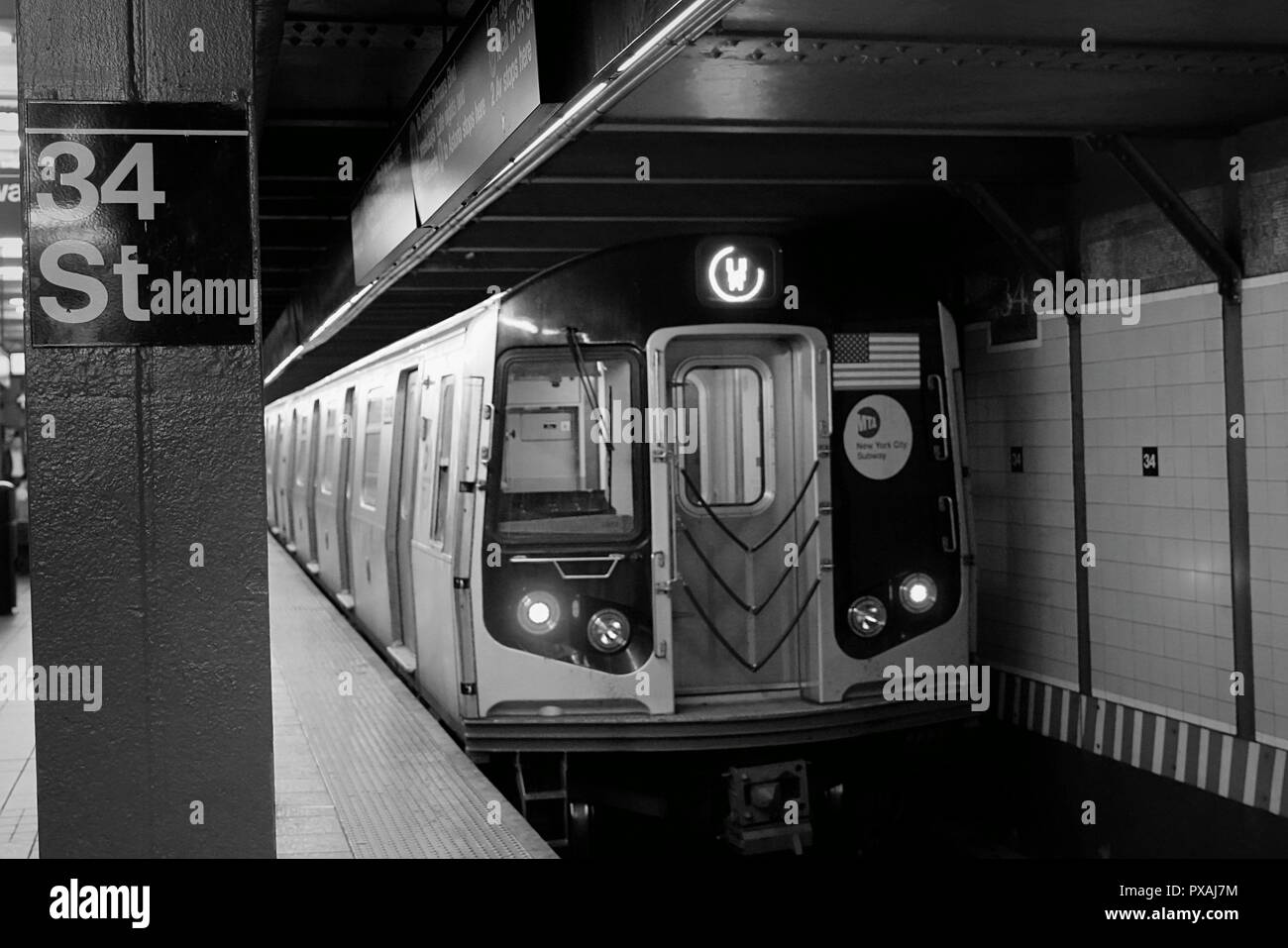 NYC Subway Trains approaching and leaving a subway station Stock Photo ...