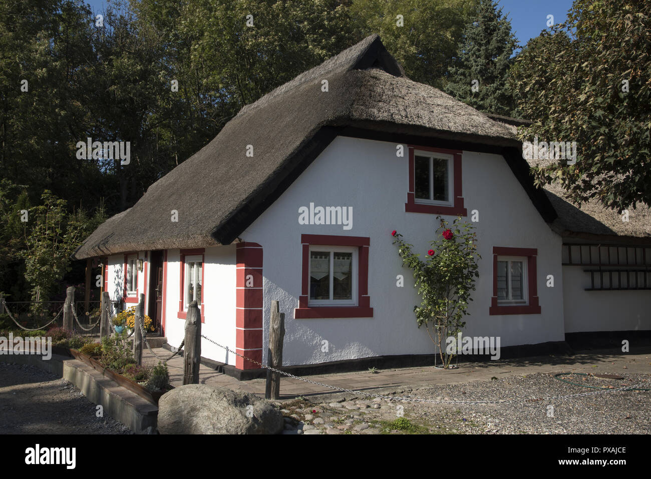 Thatch-roof house in Goor in the northernmost part of Ruegen Island in ...