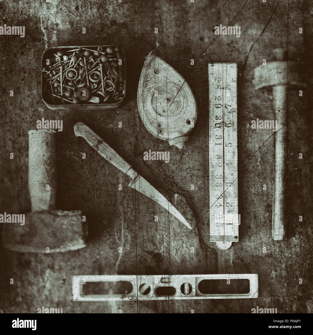 Still life of working man's tools with monochrome wet plate effect ...