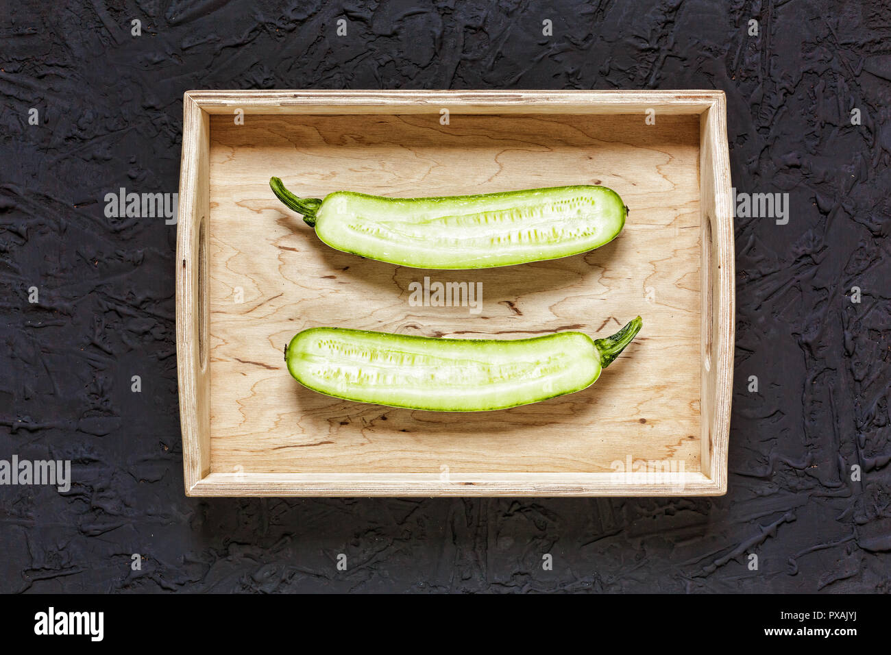 young zucchini-zucchini, cut in half. Still life. Concept: food ...