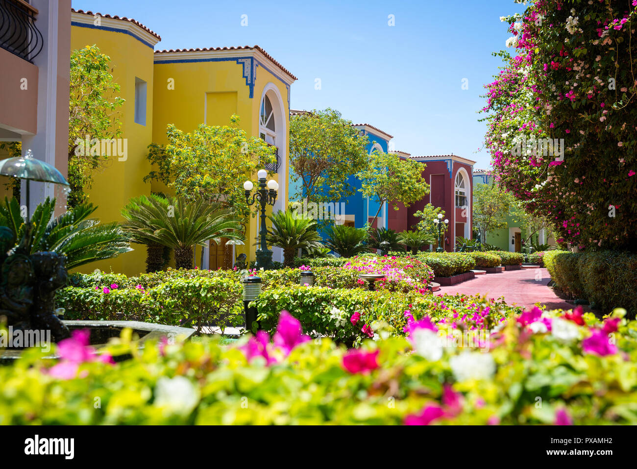 beautiful road with colorful houses Stock Photo - Alamy