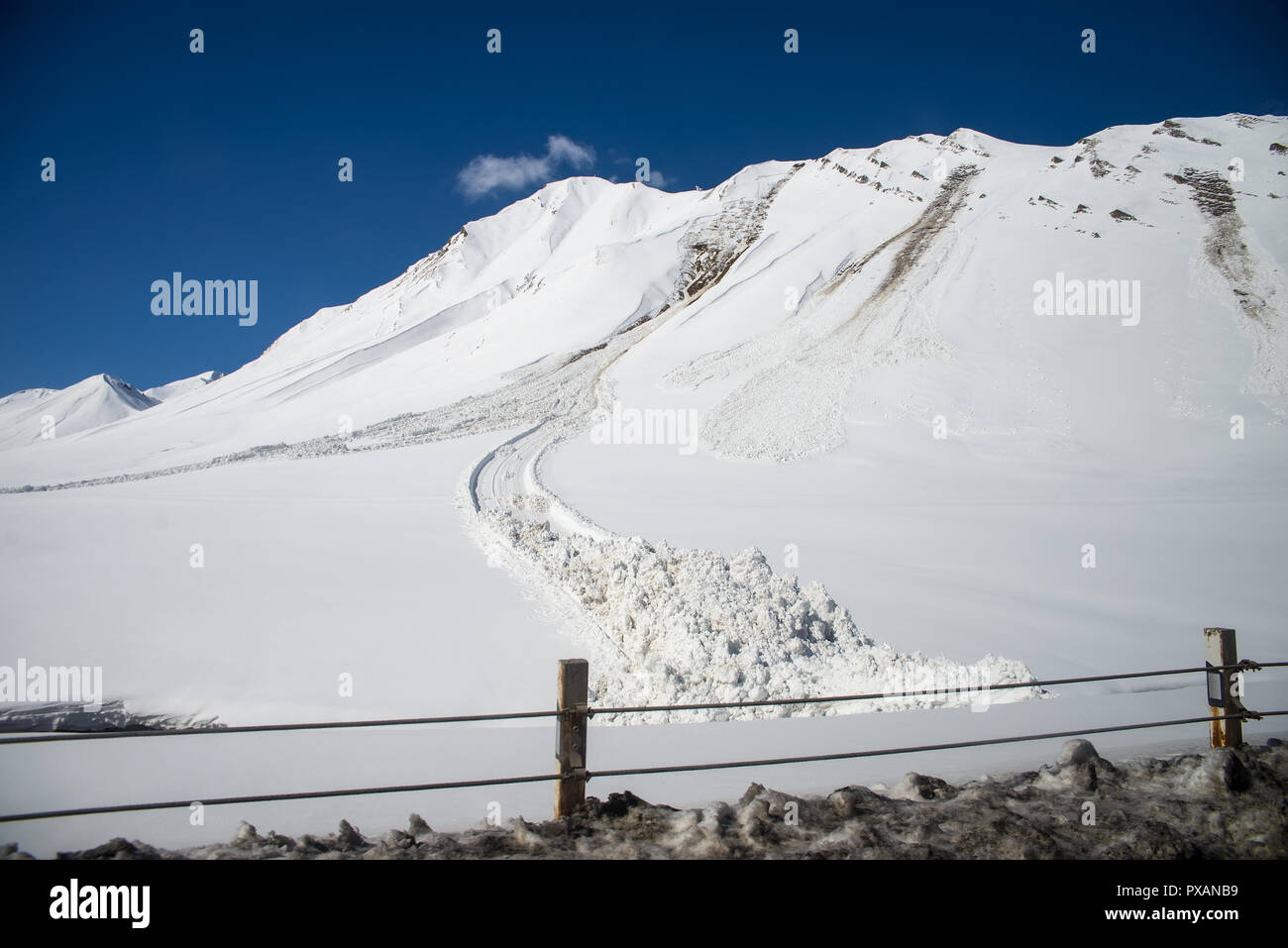 avalanche near the road Stock Photo - Alamy