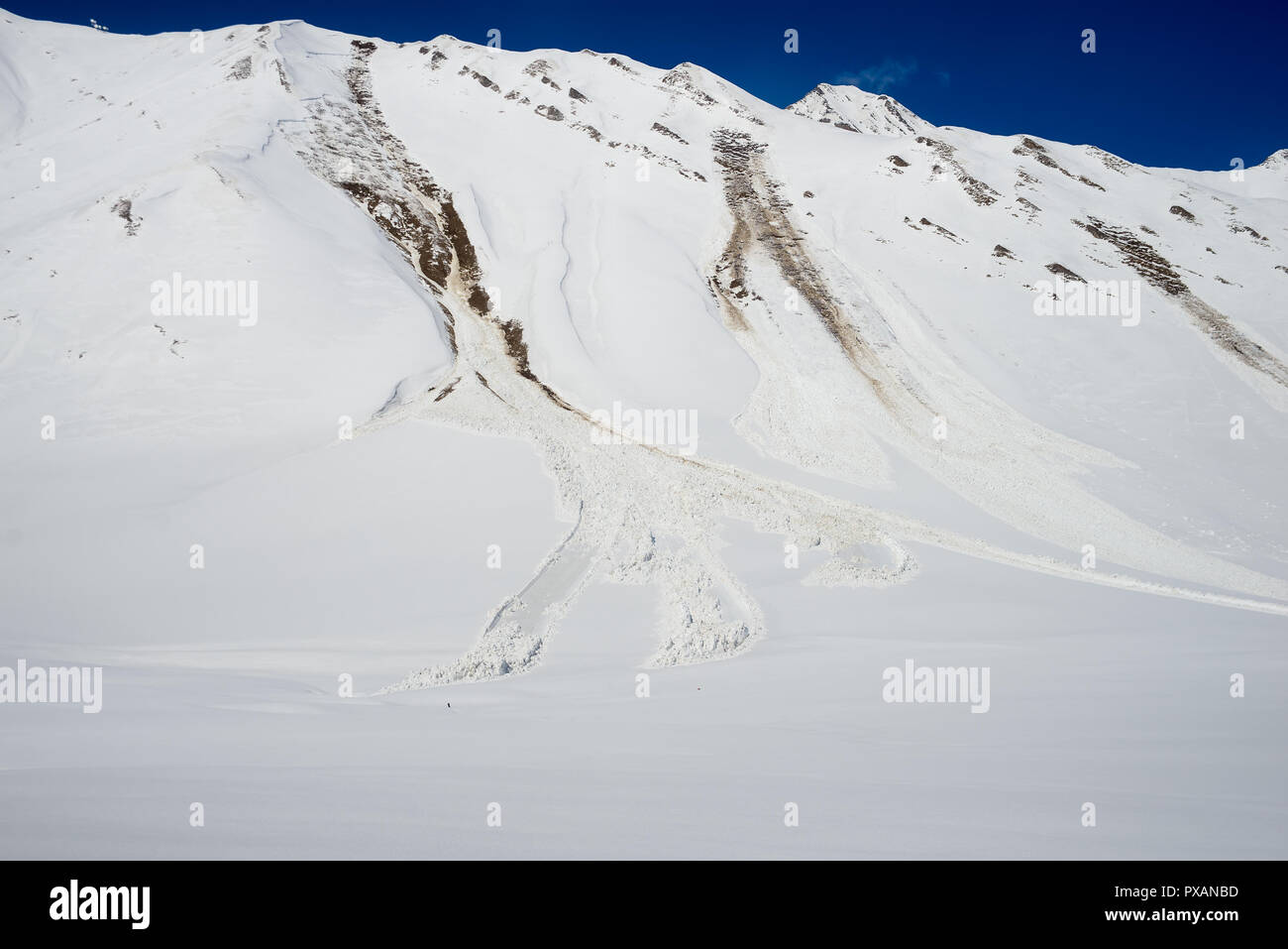 avalanche near the road Stock Photo - Alamy