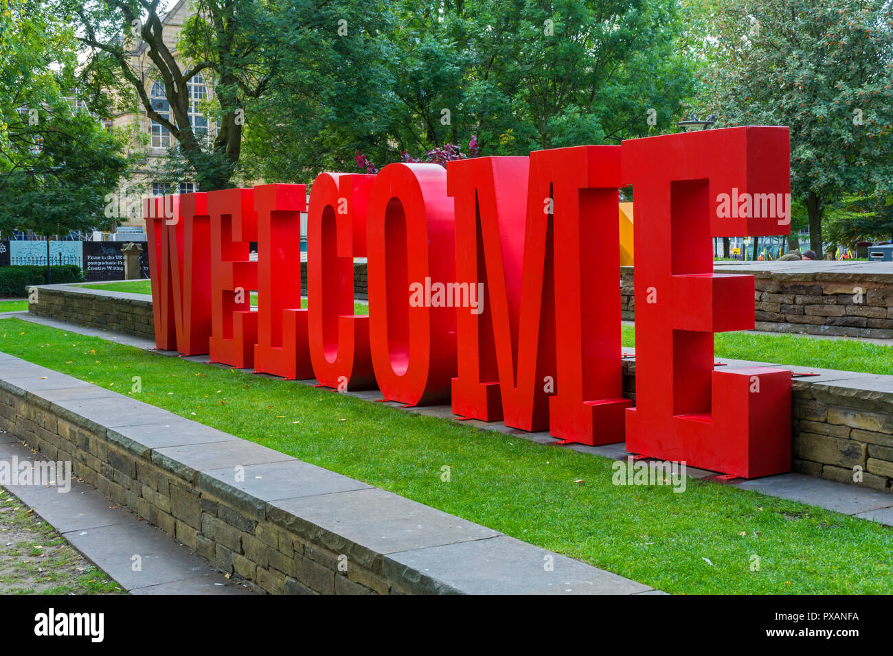 Large 'welcome' sign at All Saints Park, in aid of the Manchester ...