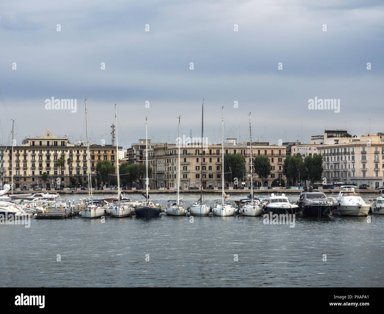 Sea bay and fishing boats on the background of beautiful, Italian, old ...