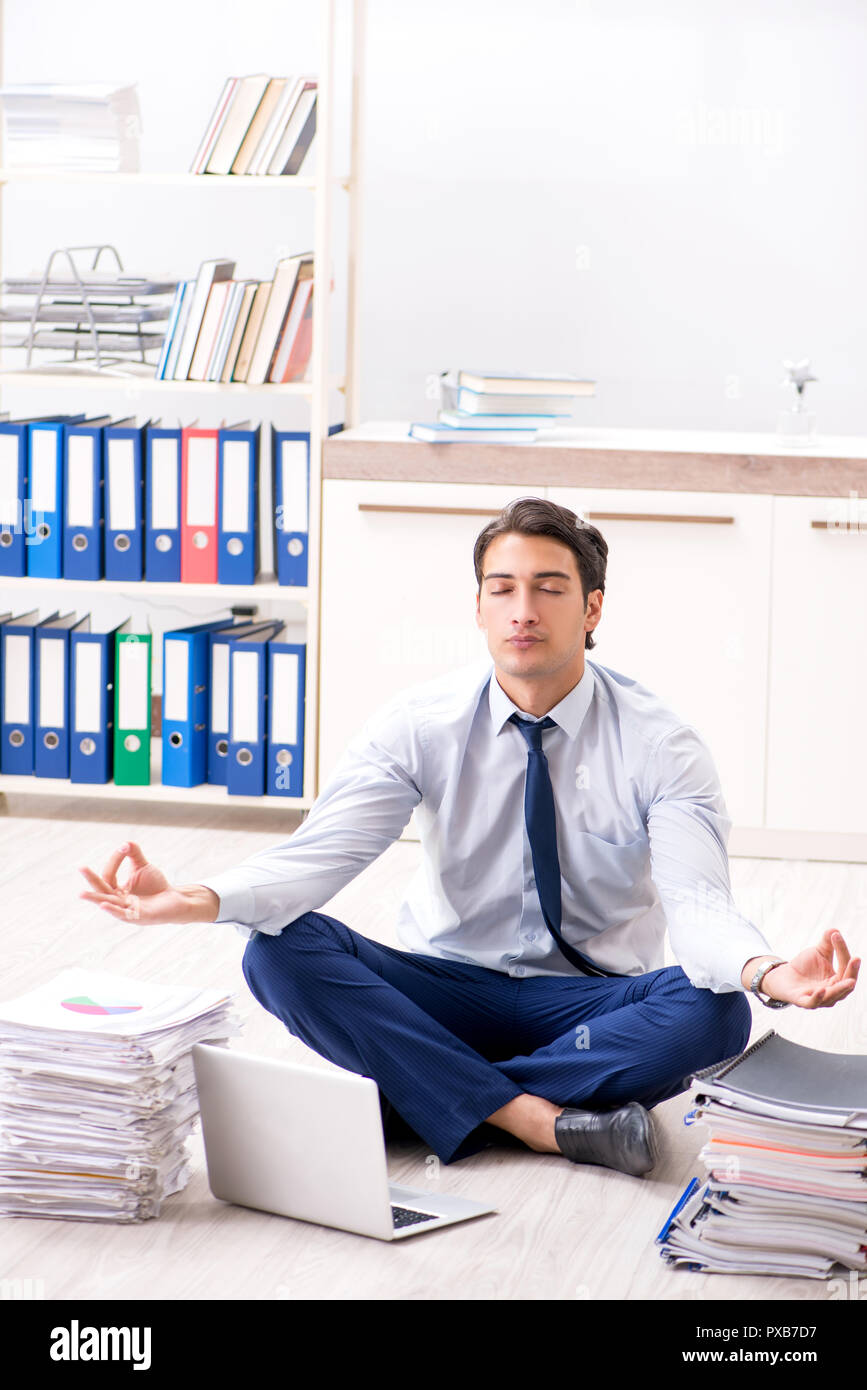Extremely busy employee working in the office Stock Photo - Alamy
