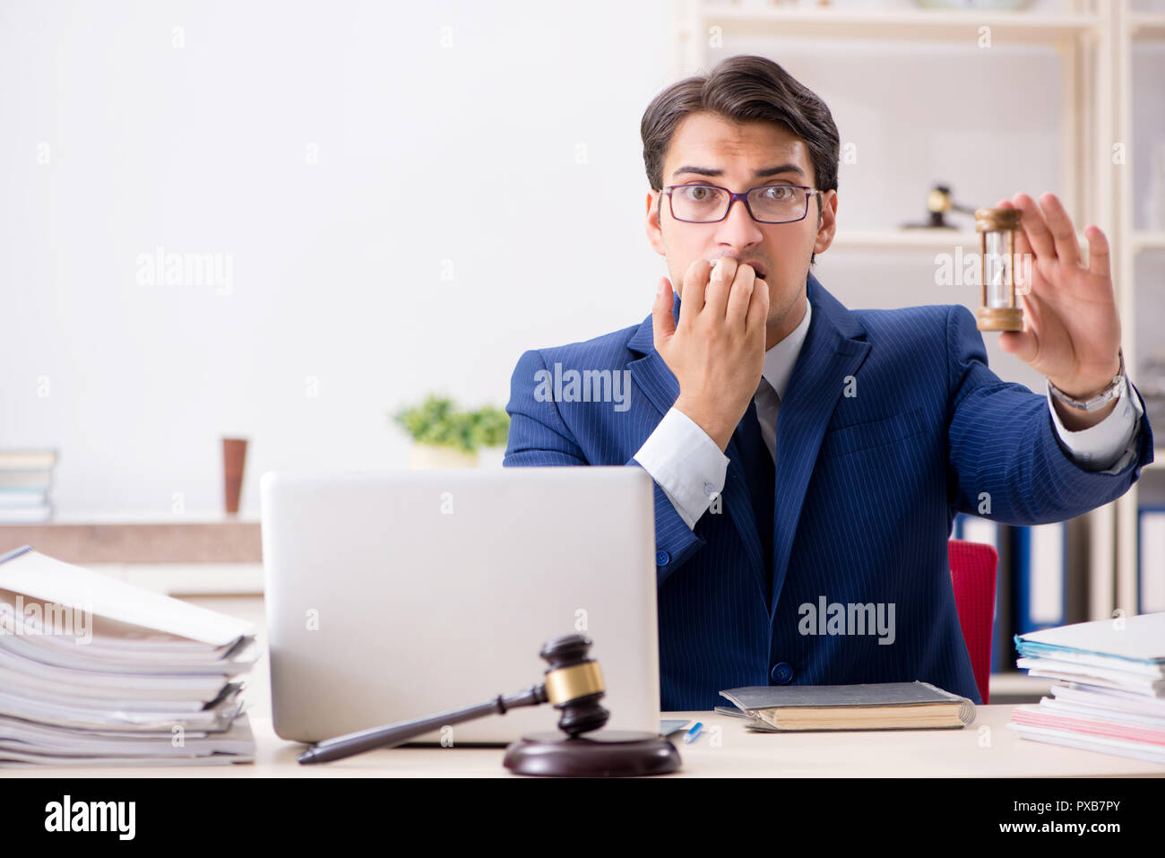 Young handsome judge working in court Stock Photo - Alamy