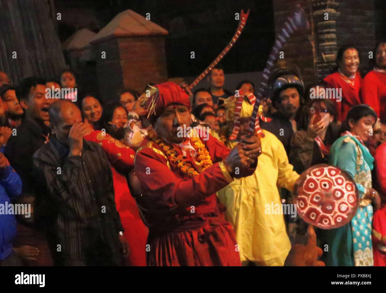 Kathmandu, Nepal. 19th Oct, 2018. A devotee dressed up as deity ...