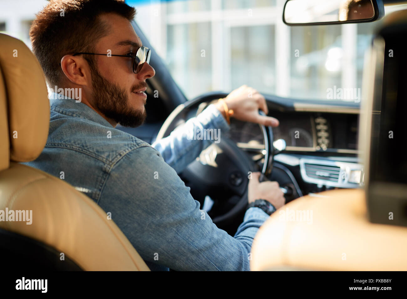 Fashion model male driving hi-res stock photography and images - Alamy