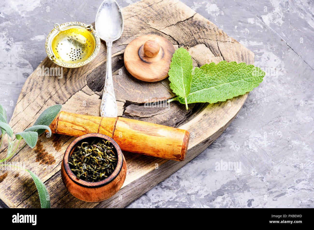 Brewed delicious herbal tea with sage on retro background Stock Photo ...