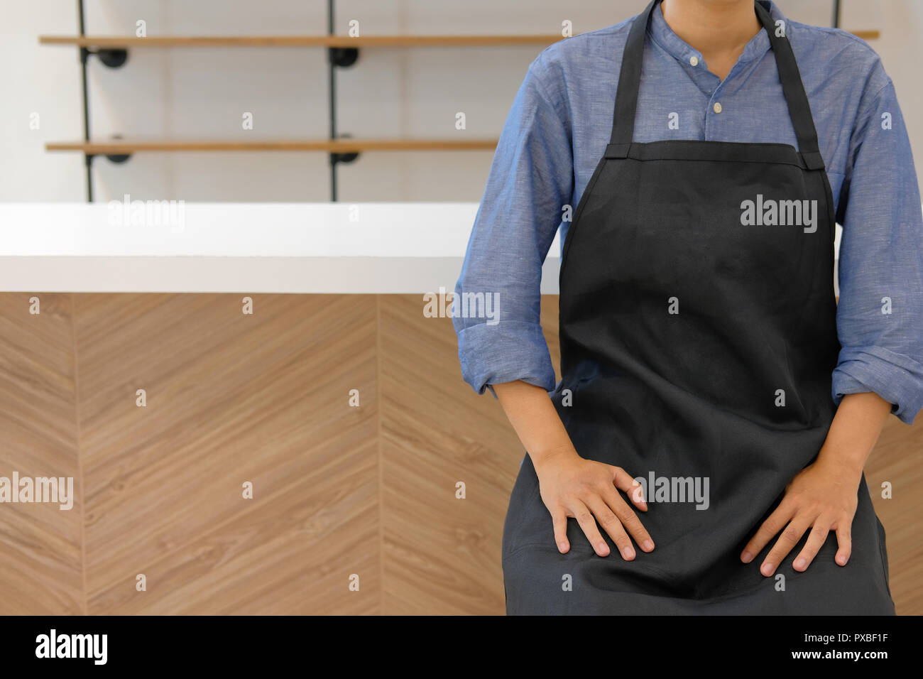 business owner wearing apron sitting at cafe coffee shop cafeteria ...
