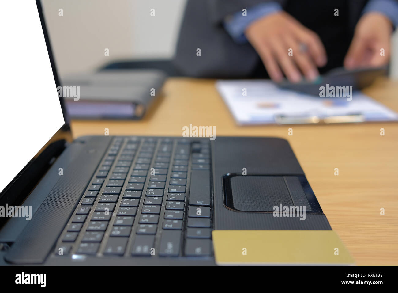 financial adviser working with calculator at office. accountant doing ...