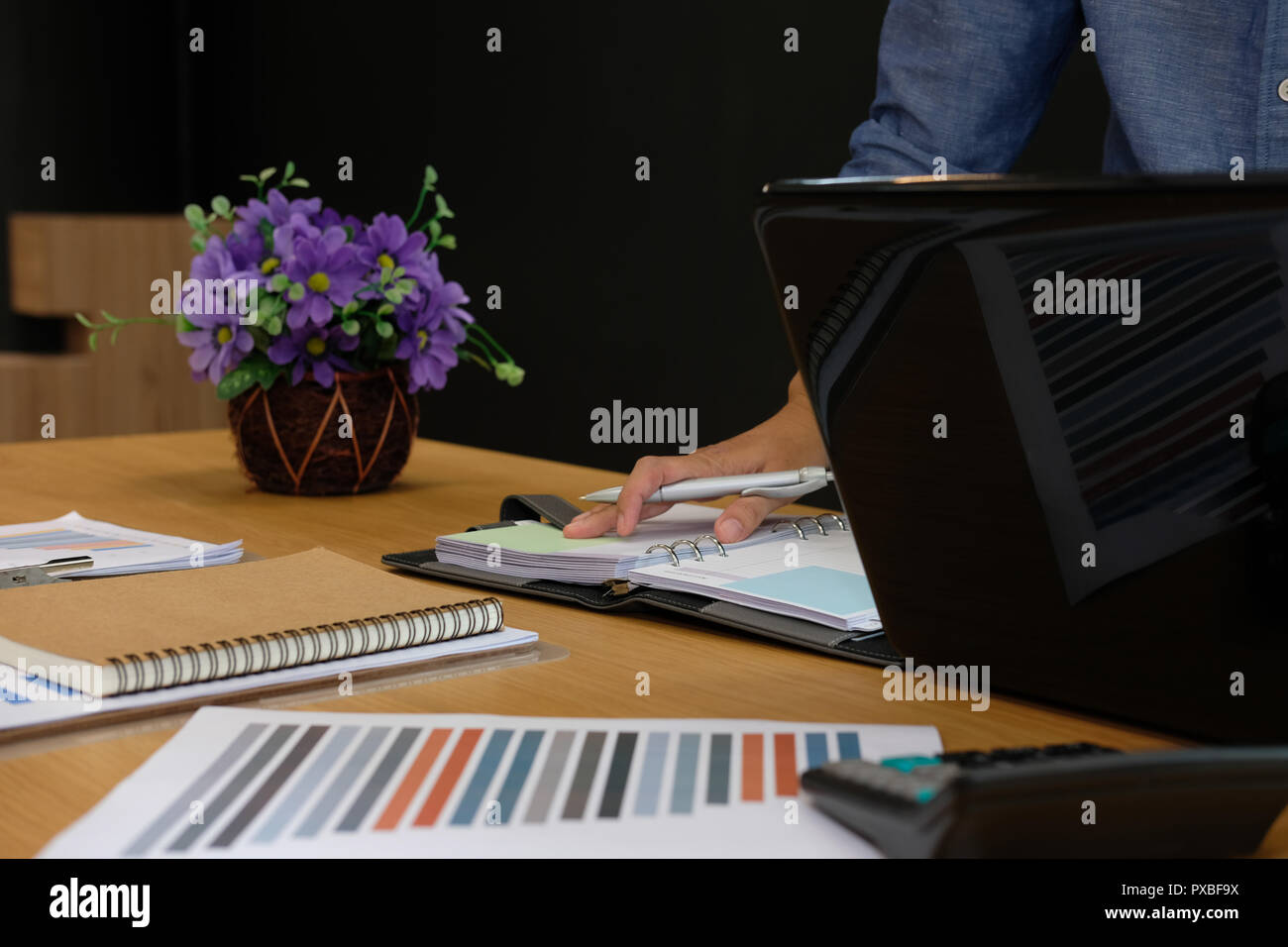 man thinking organizing plan with notebook. businessman working with ...