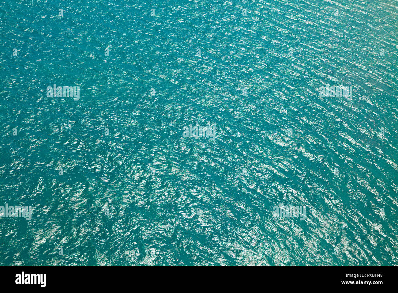Sea surface, view from the airplane, background Stock Photo - Alamy
